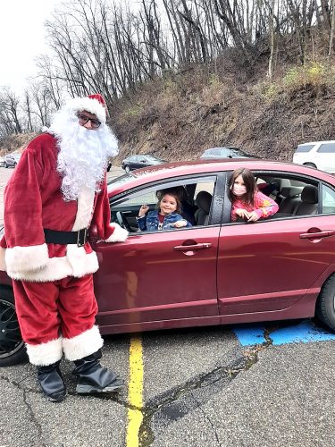 Santa drive-through | News, Sports, Jobs - The Herald Star